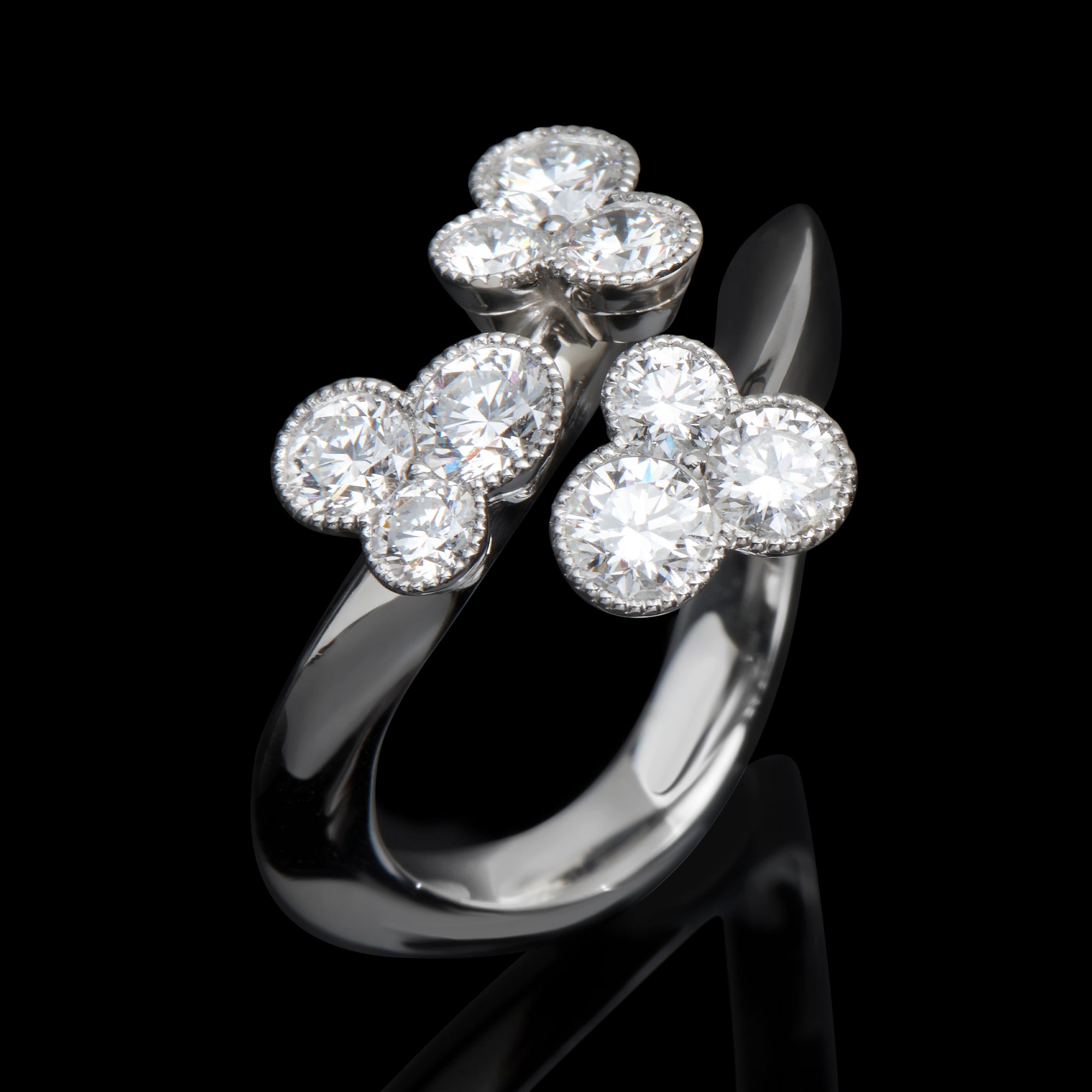 A diamond triple trefoil entwined cluster ring – Cousins Fine Jewellery