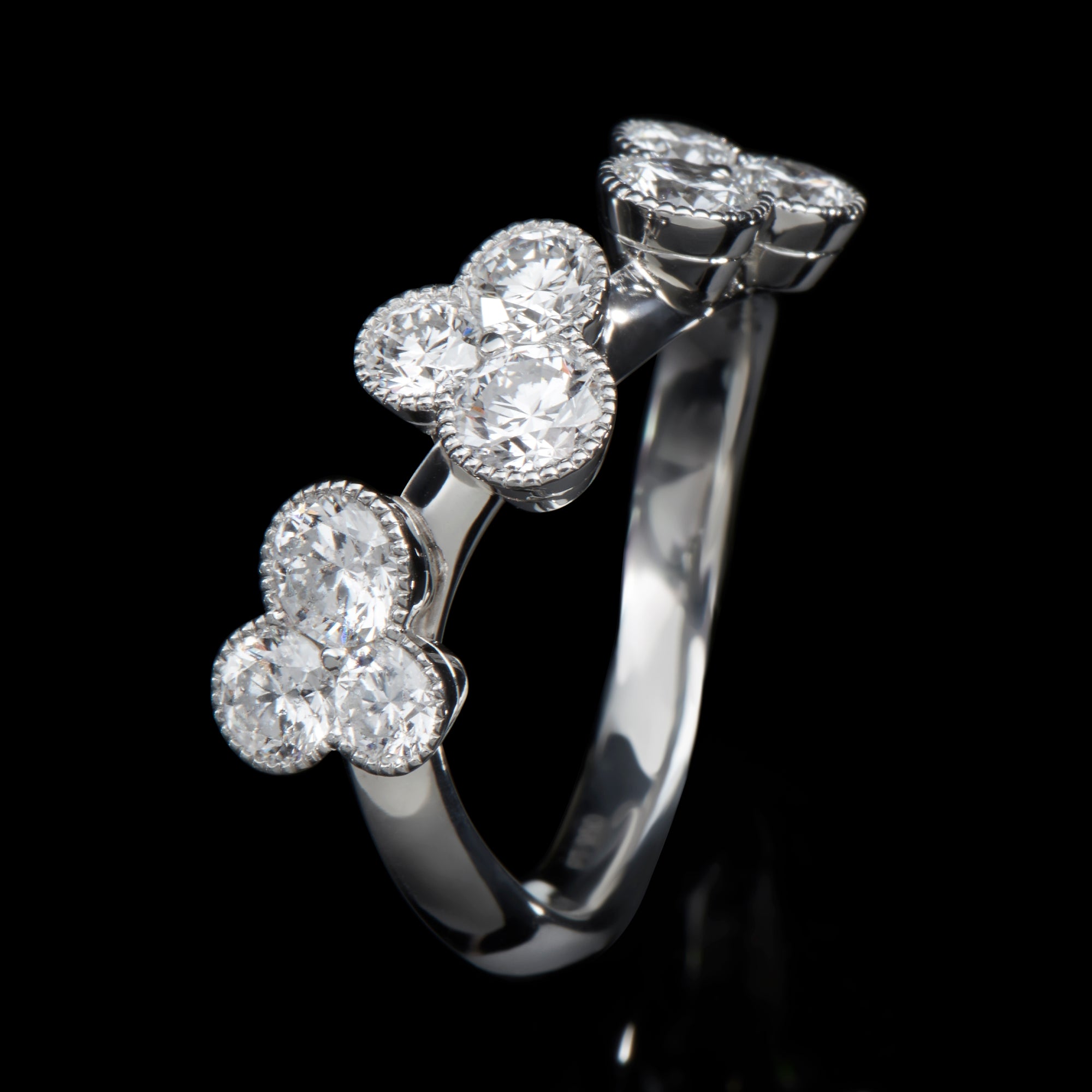 A diamond trefoil wave ring – Cousins Fine Jewellery