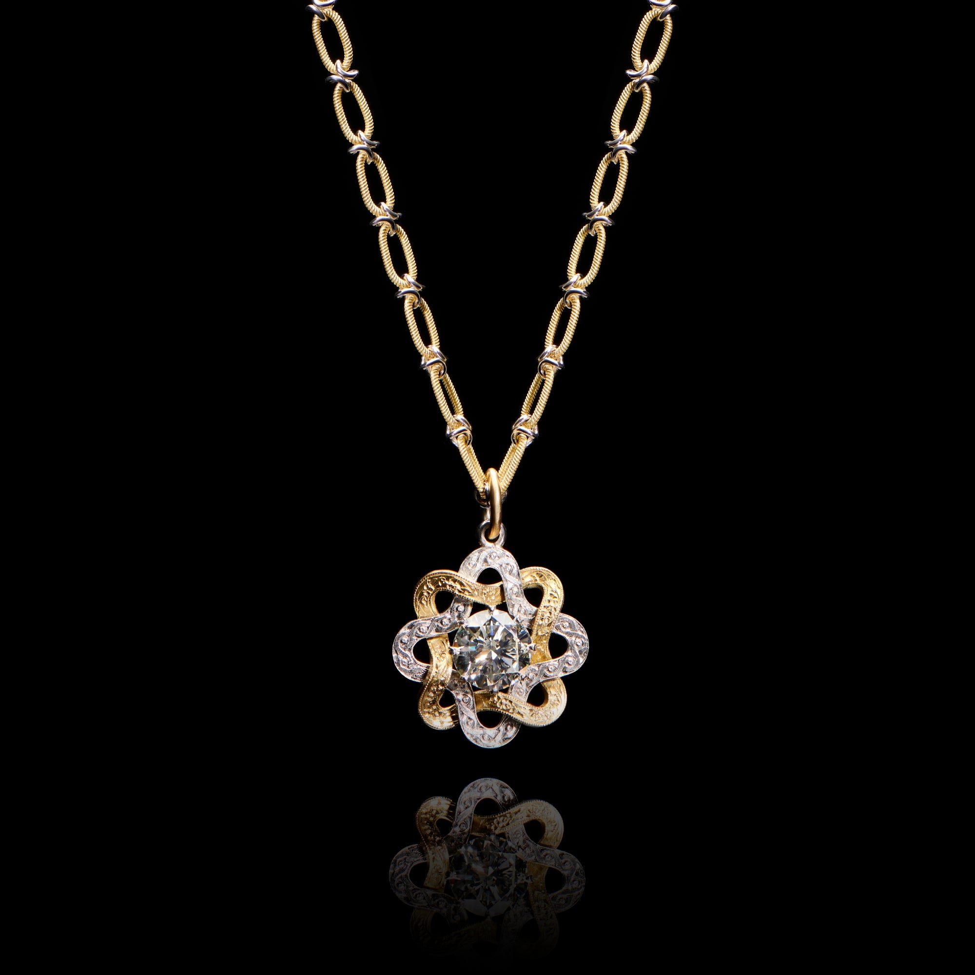A unique diamond single stone pendant – Cousins Fine Jewellery