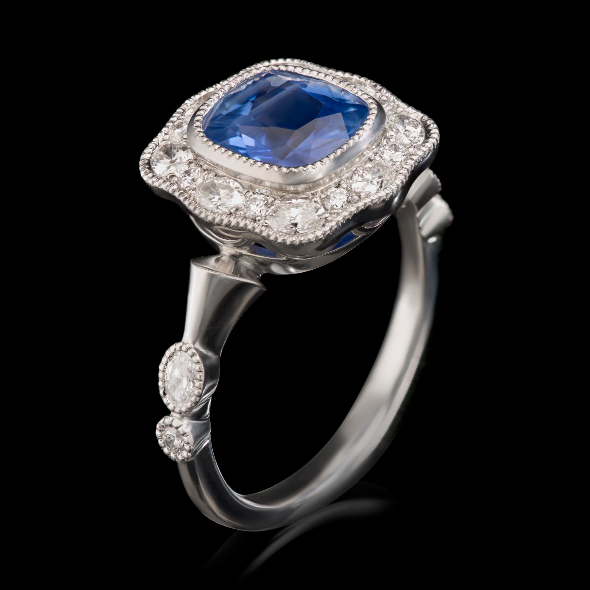 An undulating shaped sapphire & diamond cluster ring – Cousins Fine ...