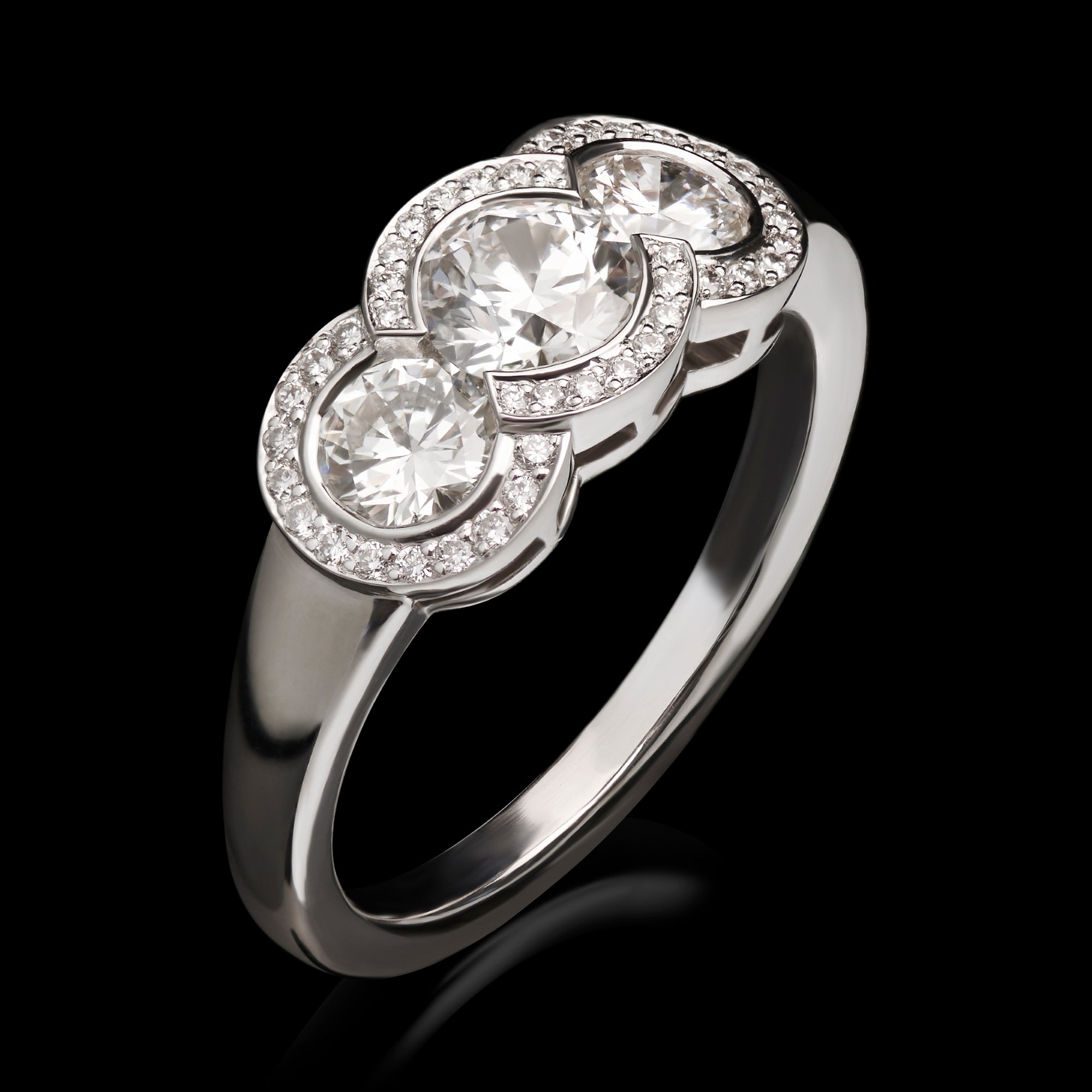 An all brilliant cut diamond triple cluster ring – Cousins Fine Jewellery