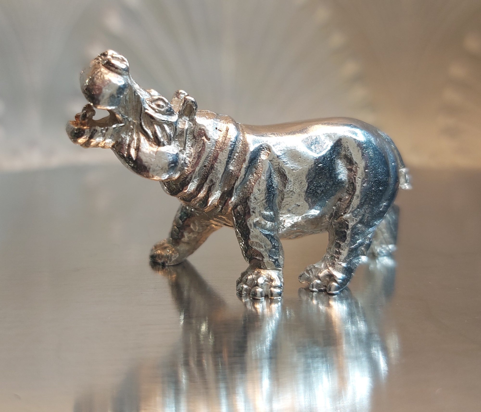 A large silver hippo model – Cousins Fine Jewellery
